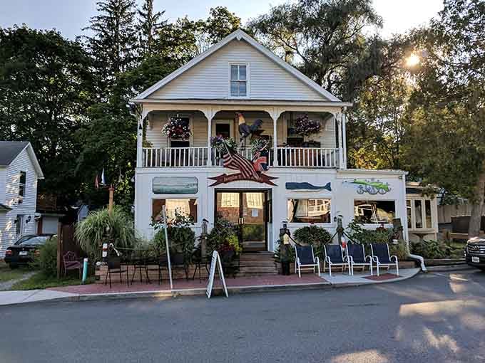 That unassuming white building with red trim is hiding some of the best burgers in Connecticut, scout's honor.