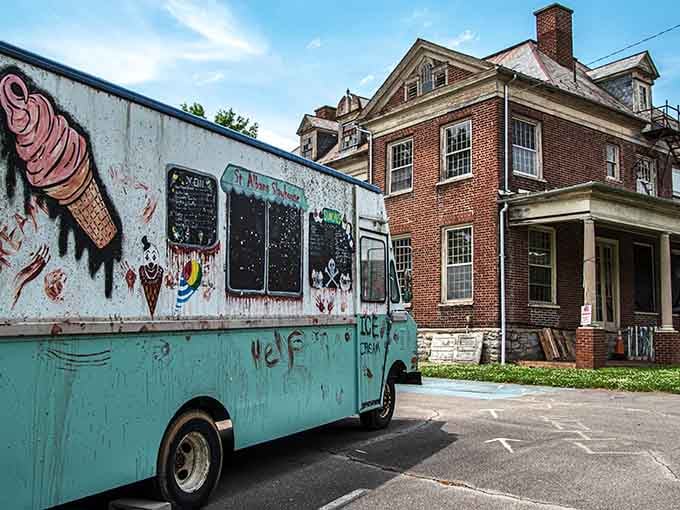 An ice cream truck parked outside an abandoned asylum is either brilliant marketing or someone's idea of dark humor.
