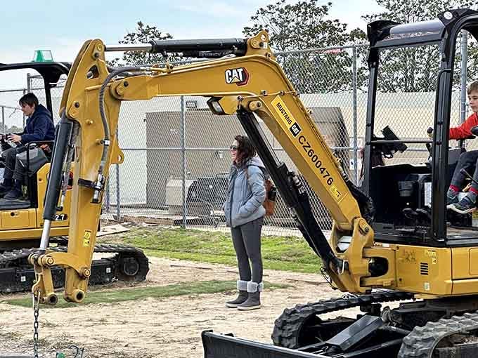 That's not a toy excavator—it's the real deal, complete with hydraulic power and childhood dreams coming true.
