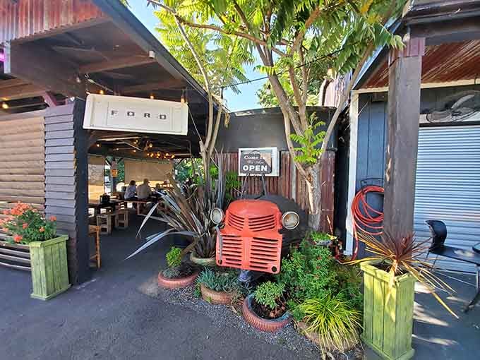 Even the entrance gets the junkyard treatment with vintage automotive touches that set the tone for your delicious adventure ahead.