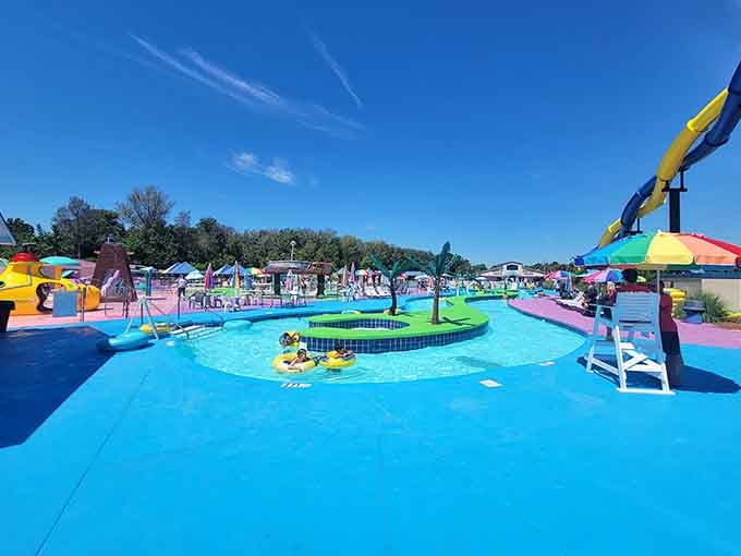 Under that perfect Carolina blue sky, this splash paradise looks like happiness decided to take physical form.