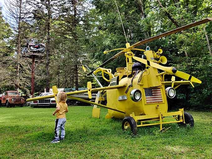 This yellow helicopter sculpture draws kids like moths to a flame, sparking imaginations faster than Saturday morning cartoons.