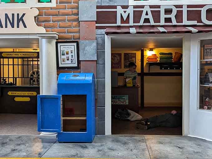 That miniature town streetscape brings back memories of simpler times when every neighborhood had its own corner store.