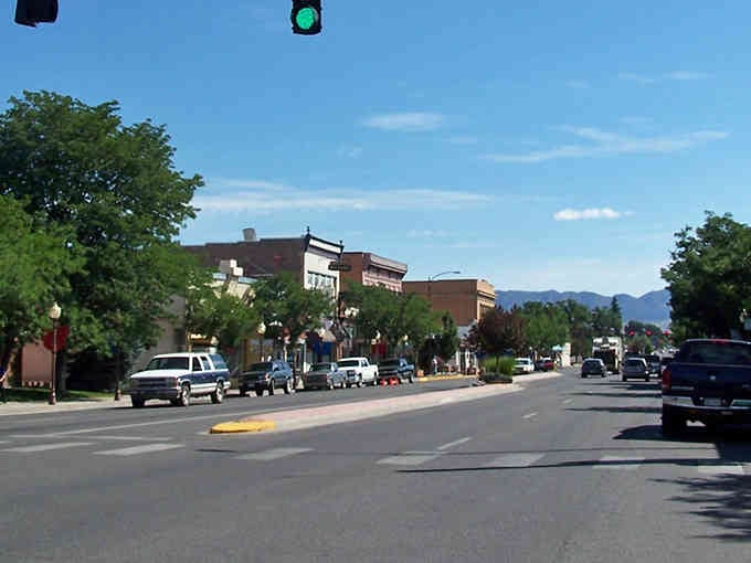 Main Street stretches toward mountain views that make every errand feel like a scenic drive.