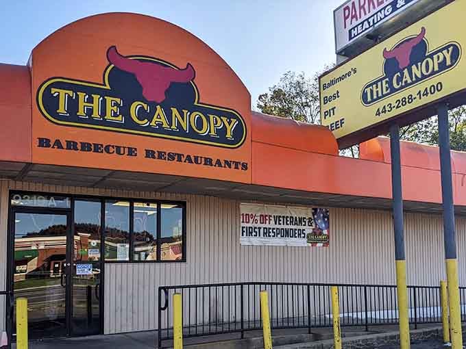 That orange canopy isn't just architectural flair, it's a beacon guiding hungry souls to barbecue salvation.