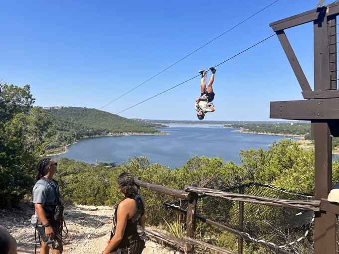 Launching into the wild blue yonder while onlookers watch someone's inner superhero make a spectacular debut over the lake.