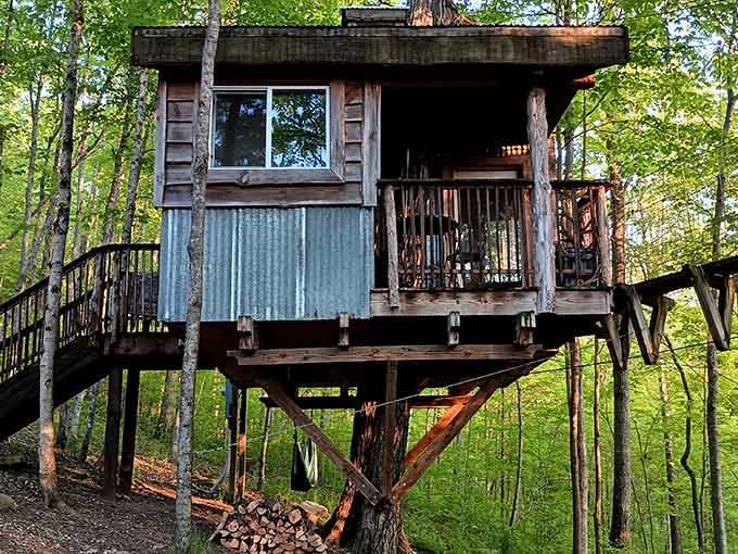 This charming treehouse sits nestled in the Kentucky forest, offering an elevated escape that's equal parts adventure and relaxation for guests.