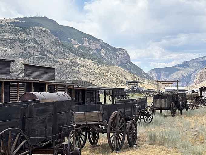 Authentic wagons against mountain backdrops prove that pioneers had incredible views but terrible suspension systems for their backs.