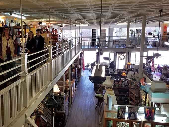 Natural light floods through windows, illuminating endless aisles where every turn reveals another century's worth of collected treasures.