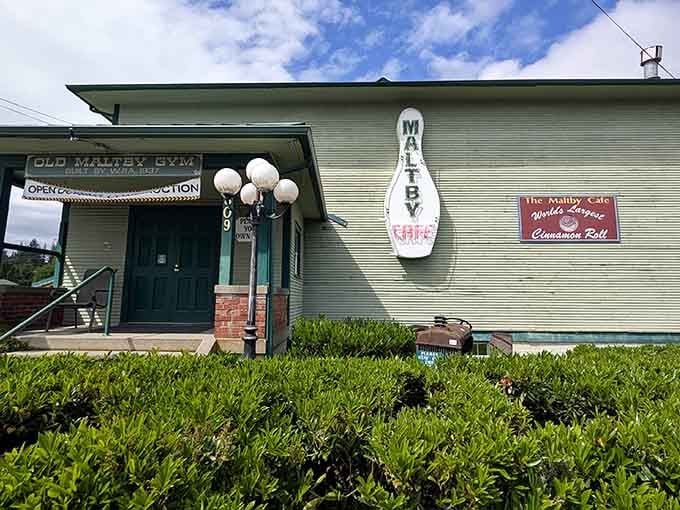 The vintage Maltby Cafe sign towers above this charming converted building, promising world-famous cinnamon rolls and hearty comfort food inside.