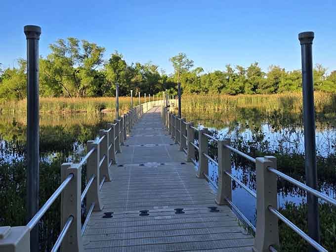 The longest floating boardwalk in America stretches before you like nature's red carpet invitation.