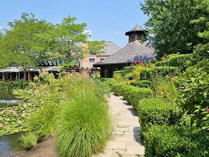Lush gardens frame charming architecture in this peaceful corner where nature and human creativity shake hands and become friends.