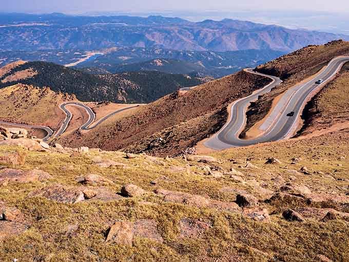 Those serpentine curves on Pikes Peak Highway look like nature's own roller coaster, minus the screaming.