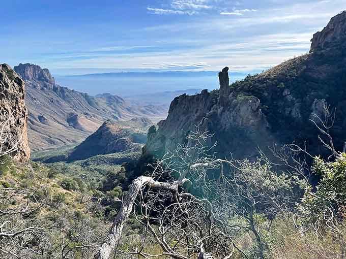 That towering rock formation isn't just showing off, it's the payoff for your climb, standing tall like nature's exclamation point at the end of a very sweaty sentence.