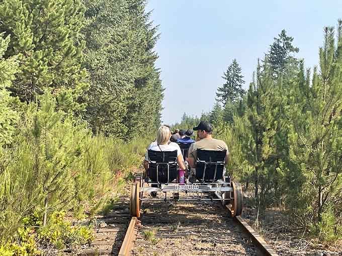 There's something wonderfully surreal about pedaling through the forest on actual railroad tracks with friends.