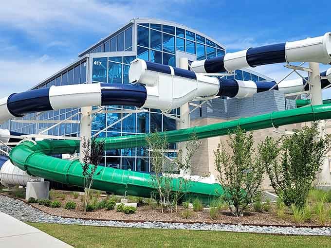 The striped slides look like giant candy canes decided to become water slides when they grew up.