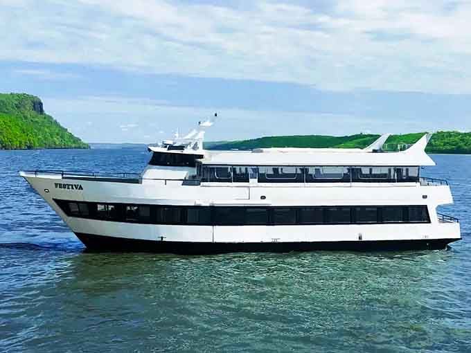 Two stories of pure floating celebration potential cruising through waters so pristine they look Photoshopped but aren't.