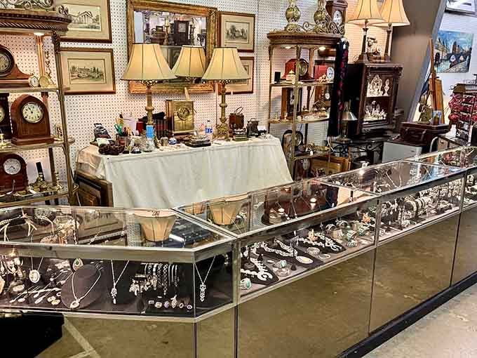 Jewelry cases stretching into infinity, because apparently one necklace is never enough when you're treasure hunting.