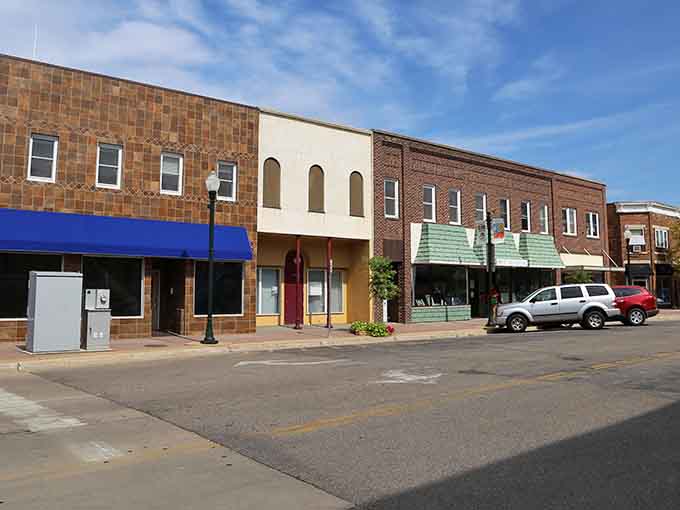 These storefronts prove that historic buildings can house thriving businesses without turning into expensive boutiques selling overpriced candles.