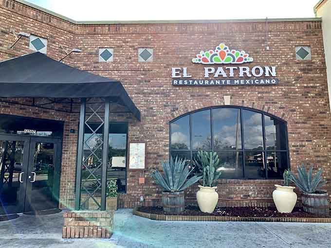 Those potted agave plants flanking the entrance aren't just decoration; they're a preview of the tequila-fueled good times ahead.