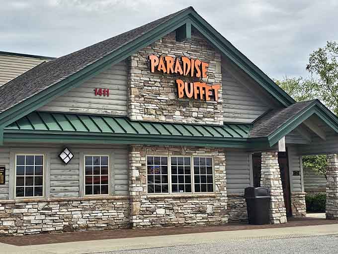 That stone facade and bold orange signage aren't just welcoming you, they're practically giving you a bear hug before you even walk in.