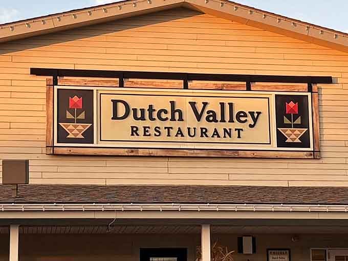 That classic sign flanked by tulip motifs promises the kind of breakfast that'll make you forget your diet exists.