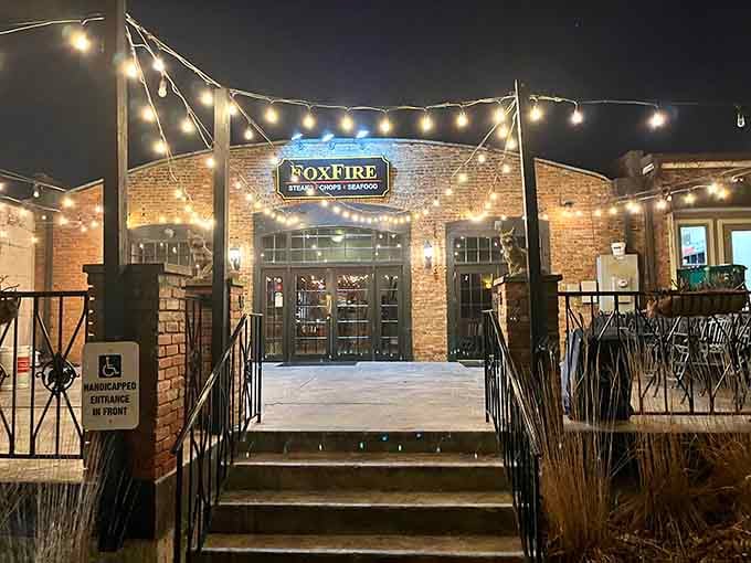 String lights and exposed brick create the perfect backdrop for your next memorable steak dinner.