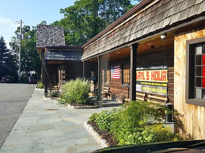 That weathered barn exterior with the bold red signage proves the best surprises hide in the most unexpected places.