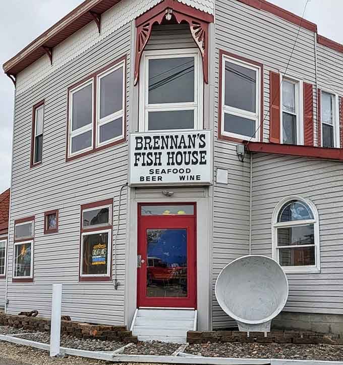 Those scalloped awnings and fish weather vane aren't just charming, they're signaling serious seafood ahead on Lake Erie's shore.