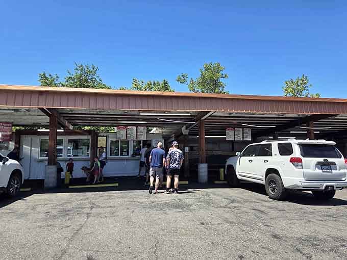 That weathered canopy has been sheltering hungry travelers and their cars for decades of delicious memories.