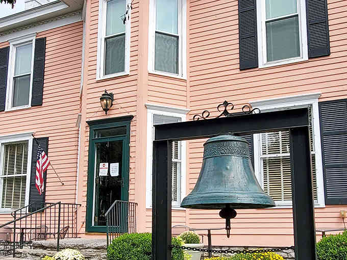 The bell outside isn't just decorative; it's practically ringing dinner guests to one of Kentucky's finest tables.