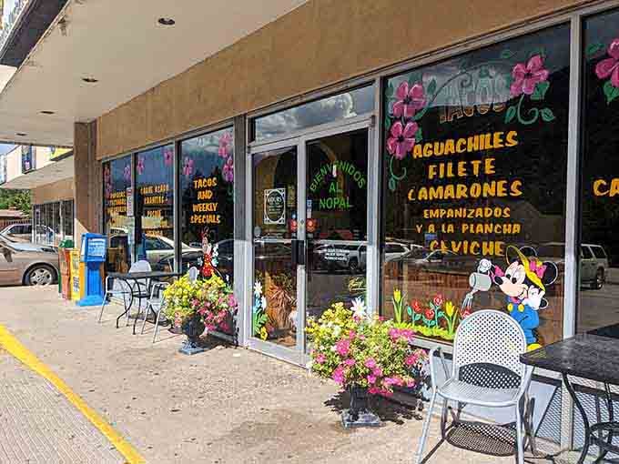 Colorful window paintings and welcoming outdoor seating invite you to discover the delicious treasures waiting inside this Glenwood Springs gem.
