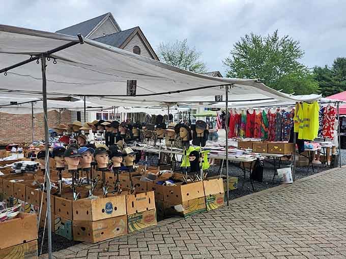 Rows of cardboard boxes filled with treasures await your discovery at this sprawling outdoor market under cheerful white tents.