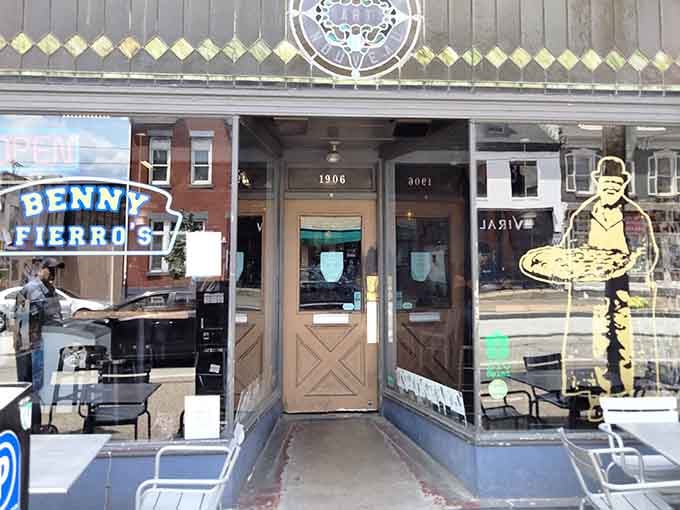 That storefront might look modest, but behind those doors awaits pizza that defies all reasonable expectations.