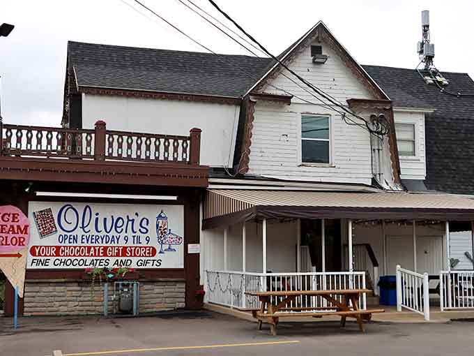 That charming white building with the welcoming porch is your gateway to sugar-fueled happiness in downtown Batavia.