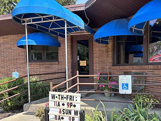 Those blue awnings aren't just for show, they're beacons guiding you to breakfast paradise in Fennville.