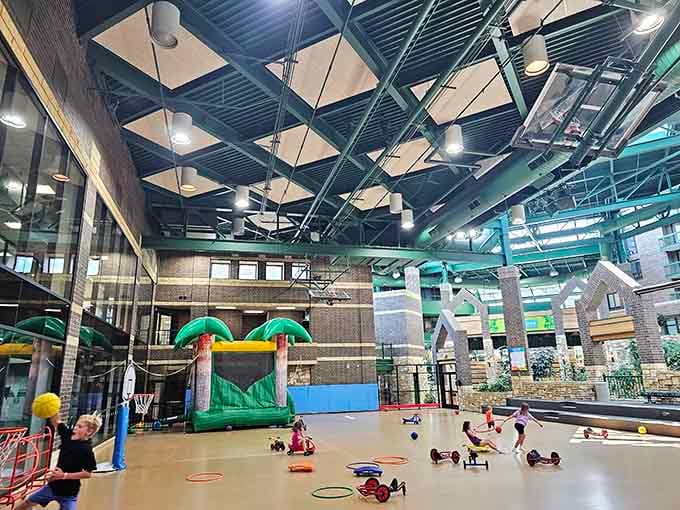 The toddler play area provides age-appropriate fun with ride-on toys and soft play equipment for the littlest park visitors.