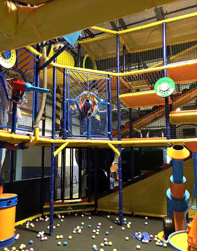 That towering play structure isn't just for kids, it's basically an architectural marvel designed for maximum fun.