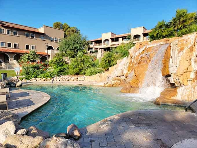 That mineral waterfall isn't just for show&mdash;it's basically a spa treatment disguised as poolside fun.