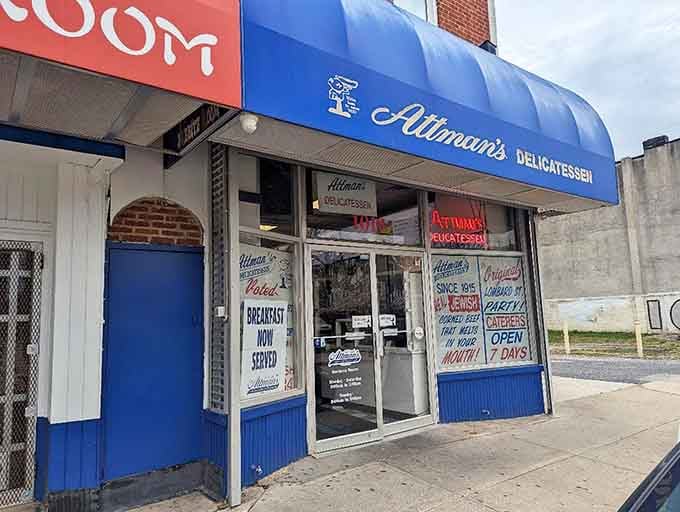 That blue awning isn't just decoration, it's a beacon calling sandwich lovers home for over a century.