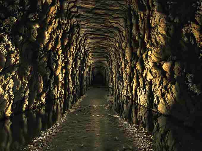 The deeper you venture, the more those rough-hewn walls reveal the backbreaking labor of another era.
