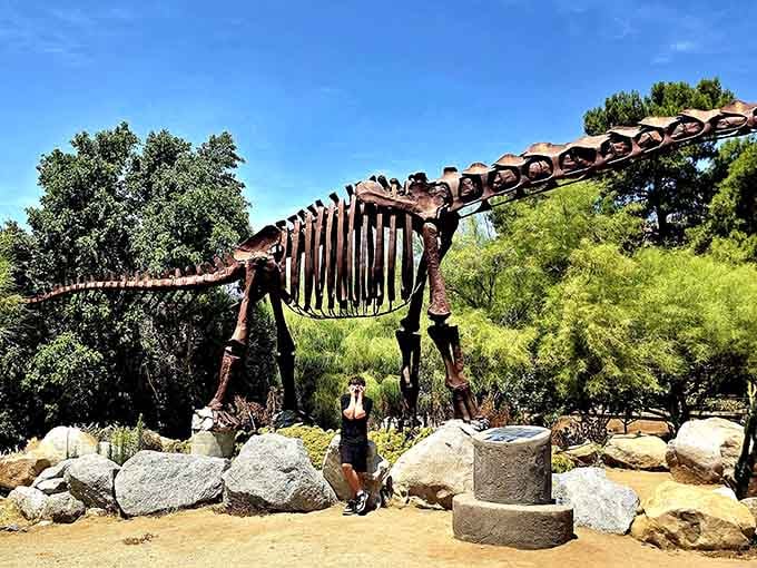 That's not a lawn ornament&mdash;that's a full-scale dinosaur reminding you why SUVs seem suddenly adorable.