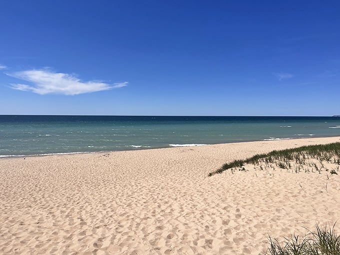 That pristine sand and turquoise water prove Lake Michigan can absolutely compete with any ocean beach you've visited.