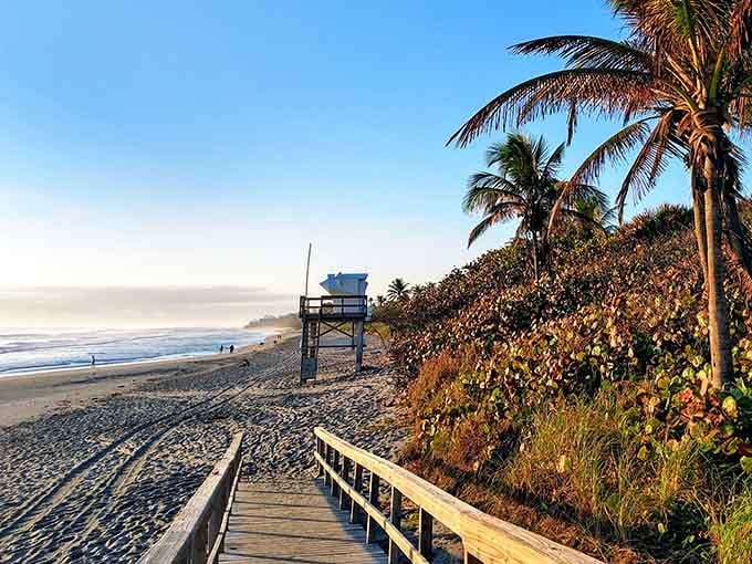 That wooden boardwalk isn't just a path to the beach, it's your personal red carpet to paradise.