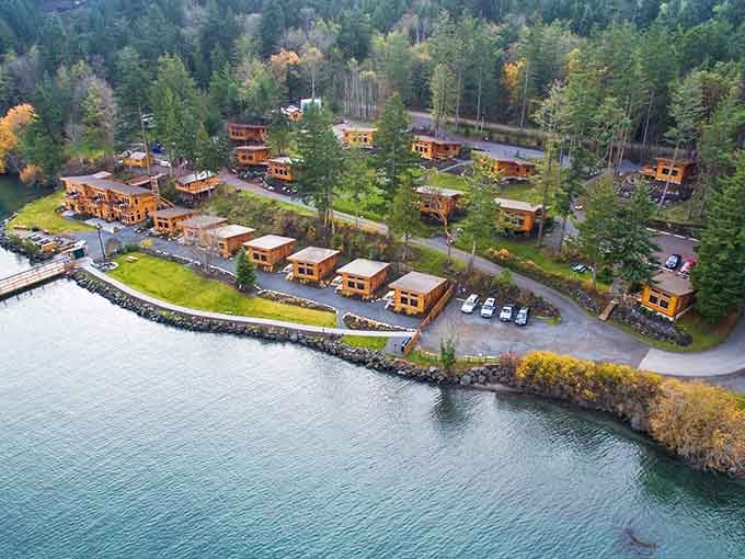 Those warm-toned bungalows nestled among towering trees prove that modern comfort and natural beauty make excellent neighbors.