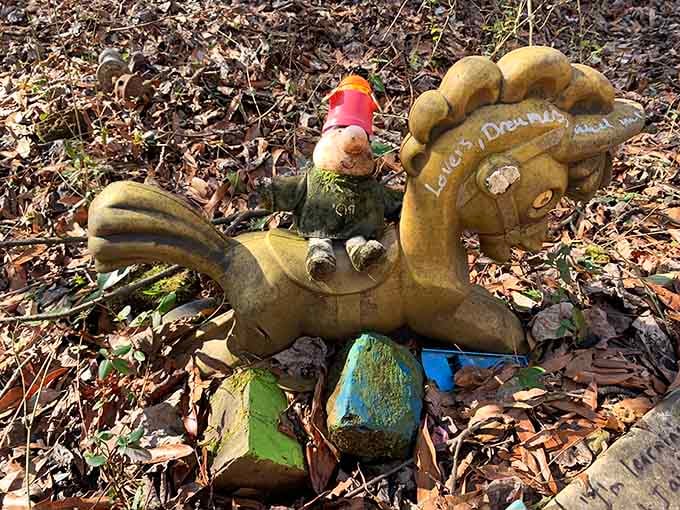 Someone's beloved rocking horse found its forever home among the leaves, creating a scene that's equal parts whimsical and wonderfully strange.