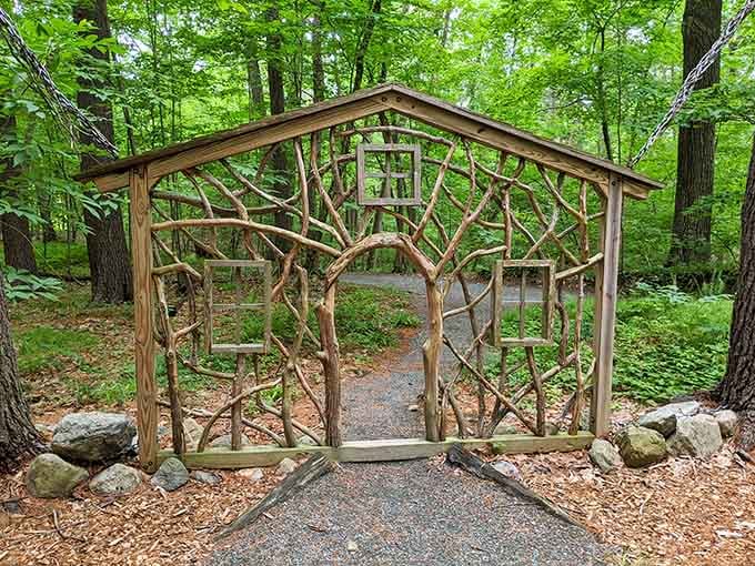 This handcrafted gateway looks like it was designed by woodland creatures who really understood the assignment.