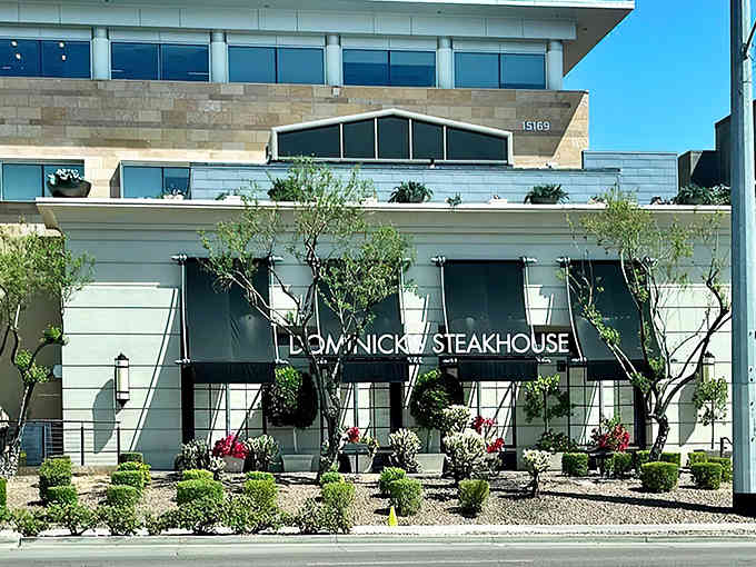 The entrance practically whispers "leave your worries outside" while the awning promises "bring your appetite inside."