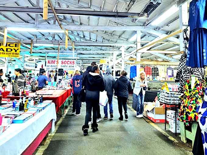Shoulder-to-shoulder shoppers navigating vendor rows like it's Black Friday, except everyone's actually having fun here.