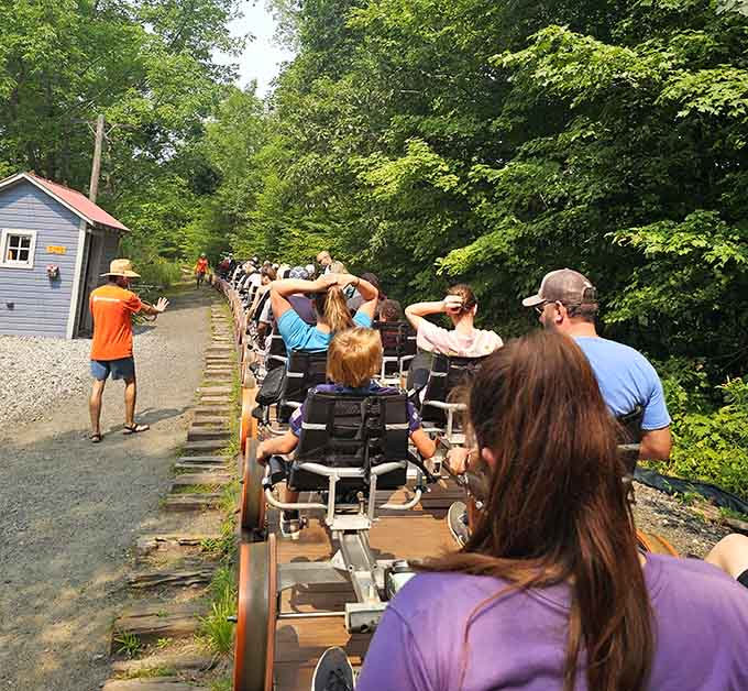 All aboard the slowest, most scenic commute you'll ever love, where pedal power meets Adirondack splendor on actual tracks.